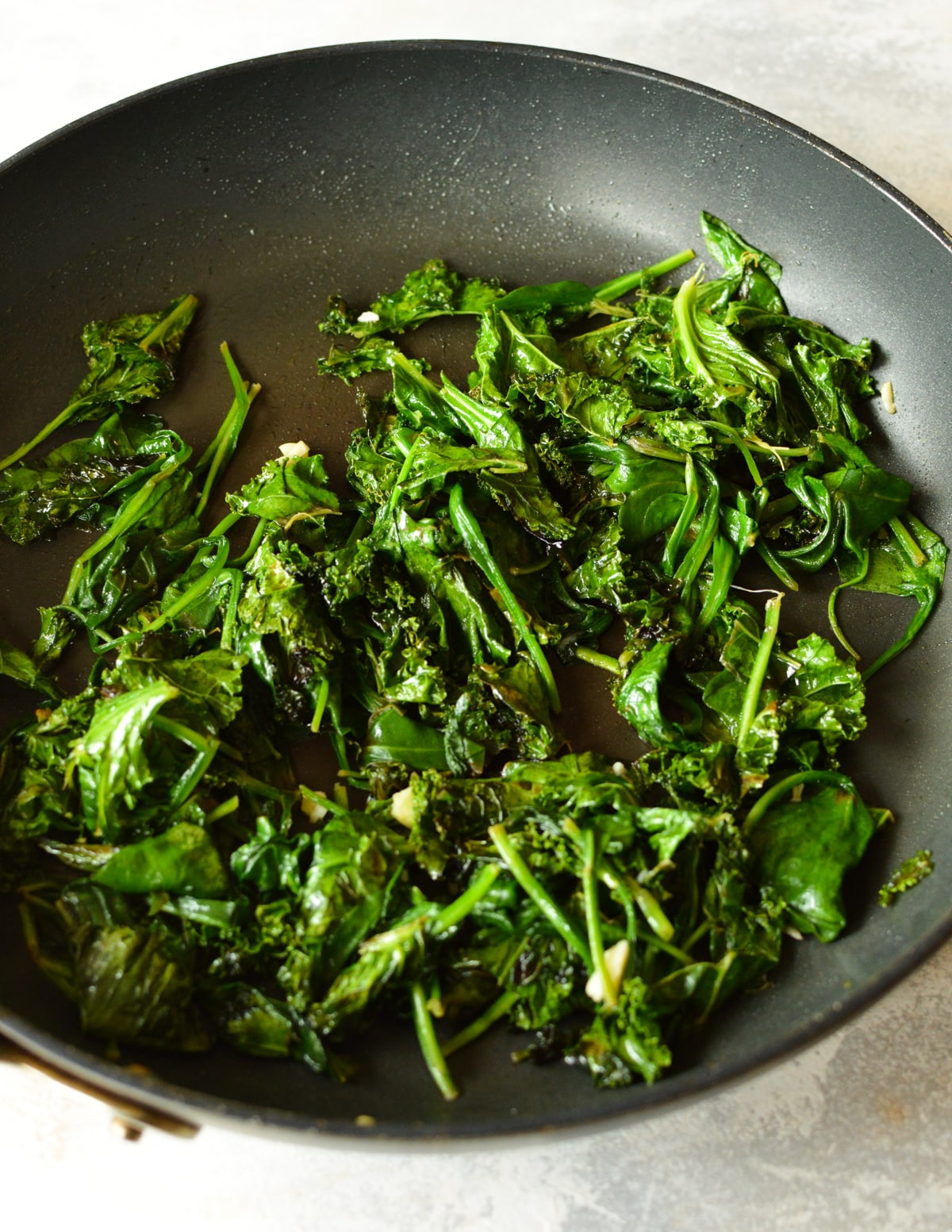 10-minute Sauteed Kale & Spinach - caramel and cashews