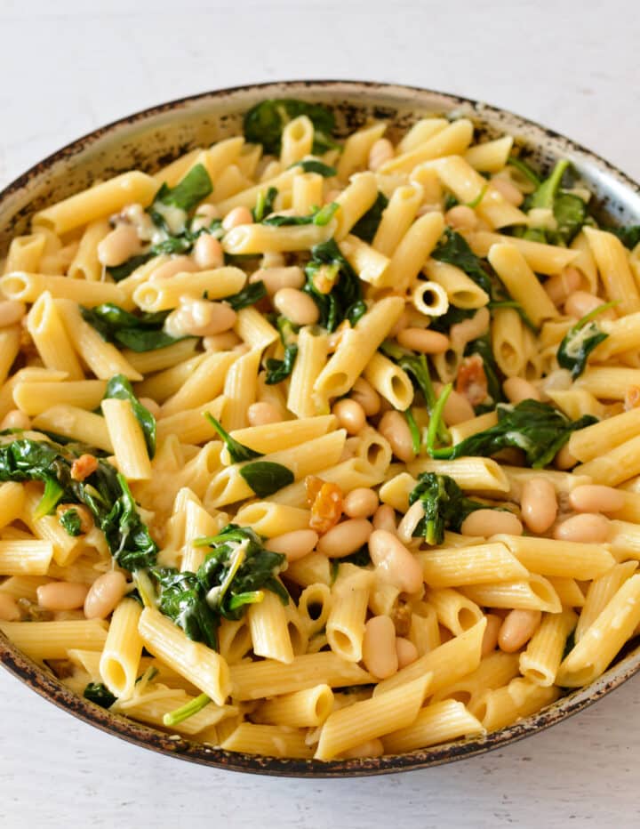 Spinach Pasta with White Beans & Parmesan - caramel and cashews