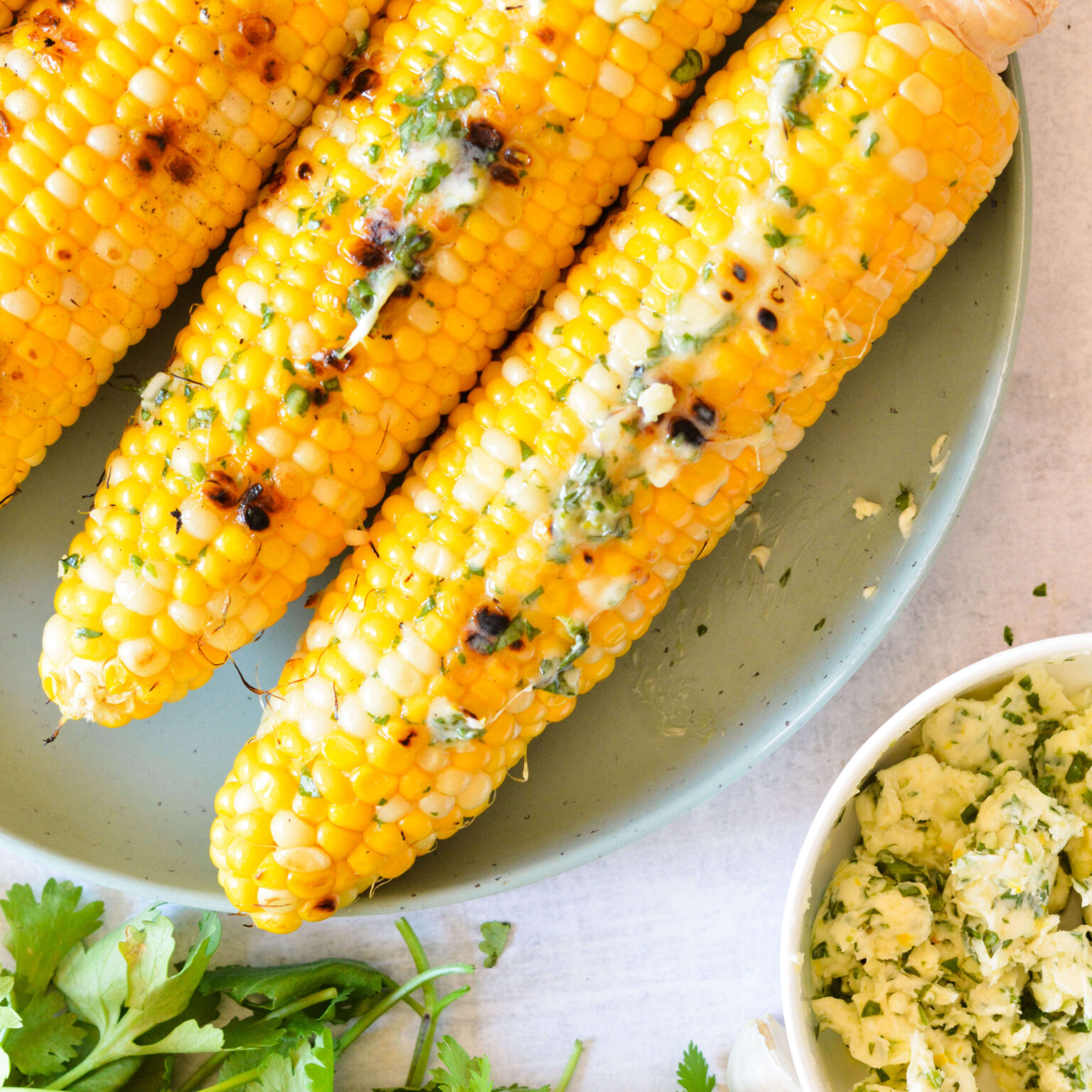Grilled Corn with Lemon Herb Butter - caramel and cashews